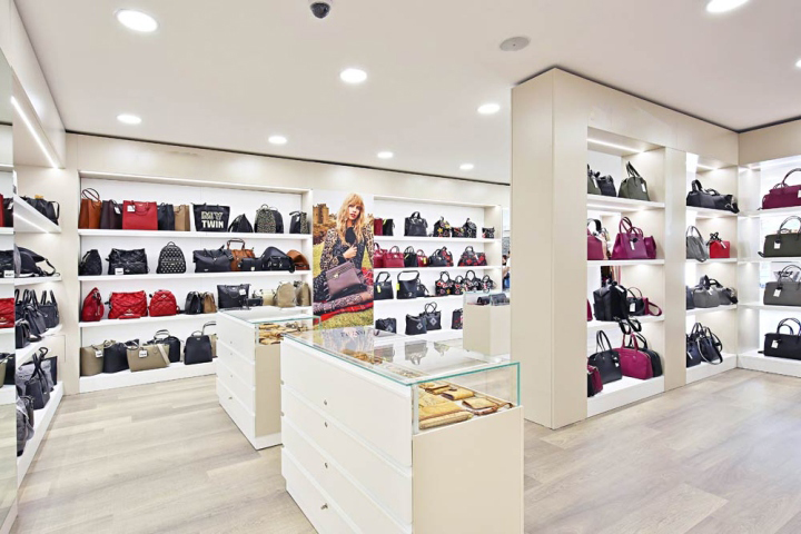 Modern handbag store design wooden curved cash counter and led handbag ...